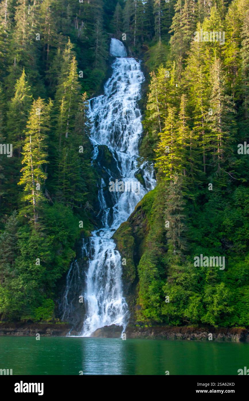 USA, Alaska, Tongass National Forest. Waterfall into Red Bluff Bay ...