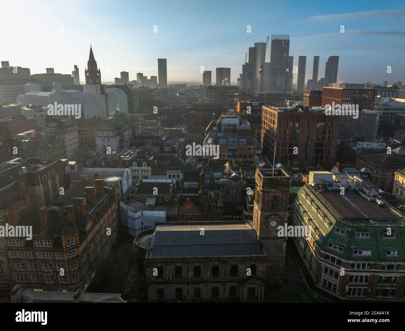 St Ann's Church with urban skyline in Manchester City Centre Stock ...