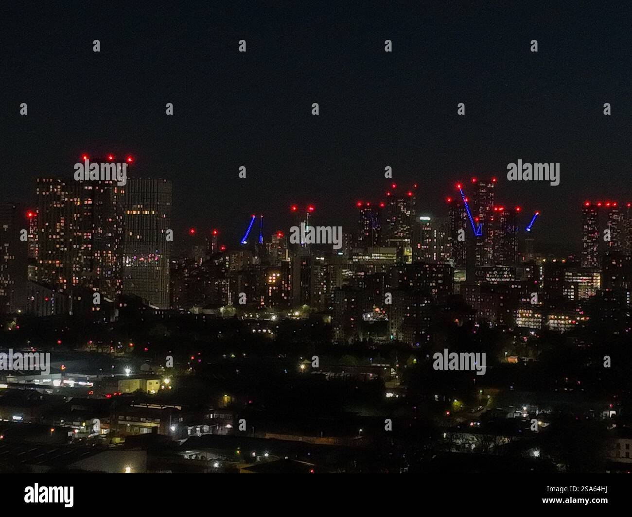 Aerial view of the Manchester skyline at dusk in Manchester City Centre ...