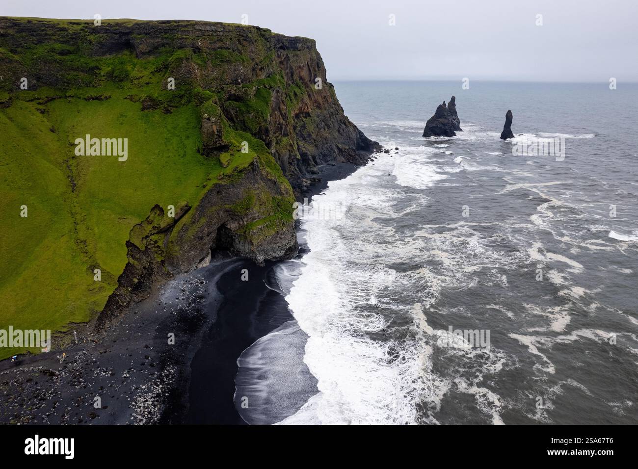 Aerial drone view of epic ocean waves crashing on the shoreline black ...