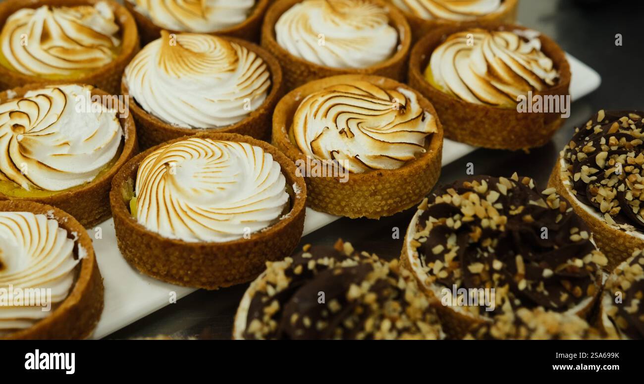 Delicious beautiful tarts with golden brown meringue topping and ...