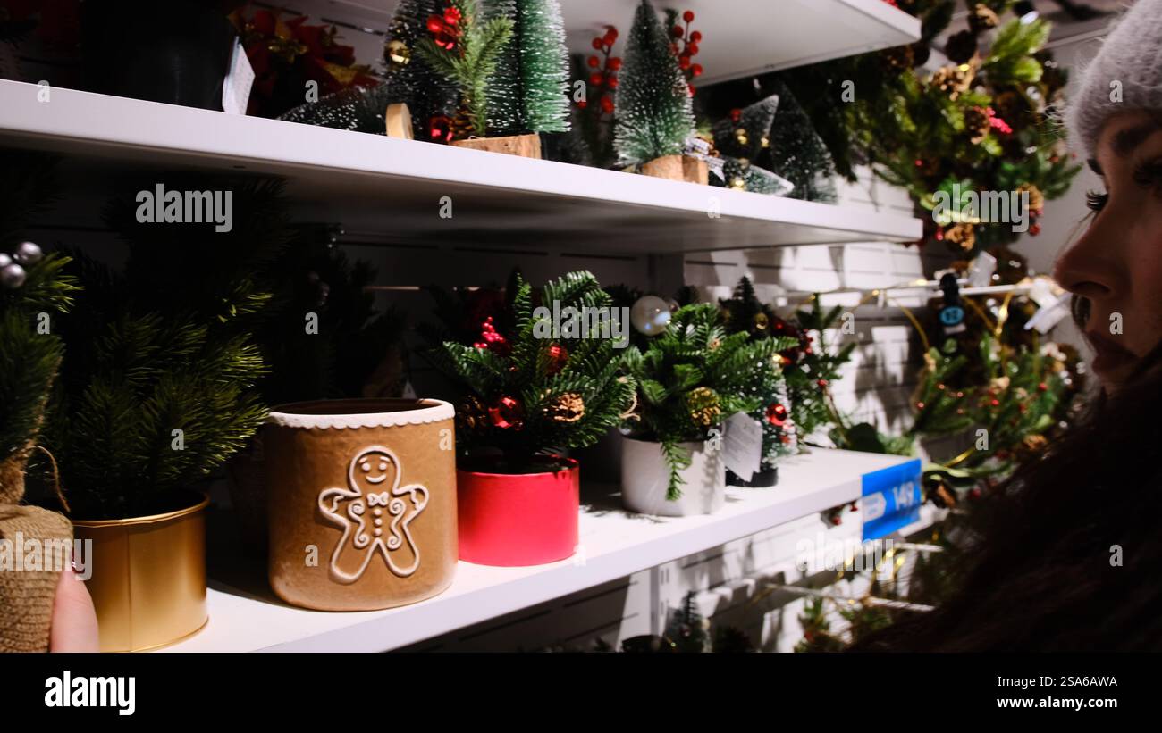 Woman selects cozy winter hi-res stock photography and images - Alamy