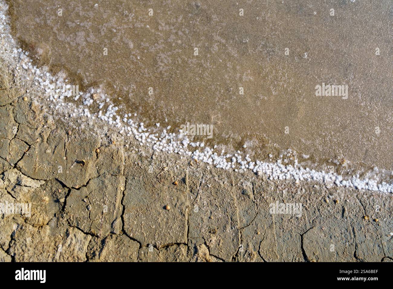 Small salt lakes for sea salt harvesting on the coast of France Stock ...