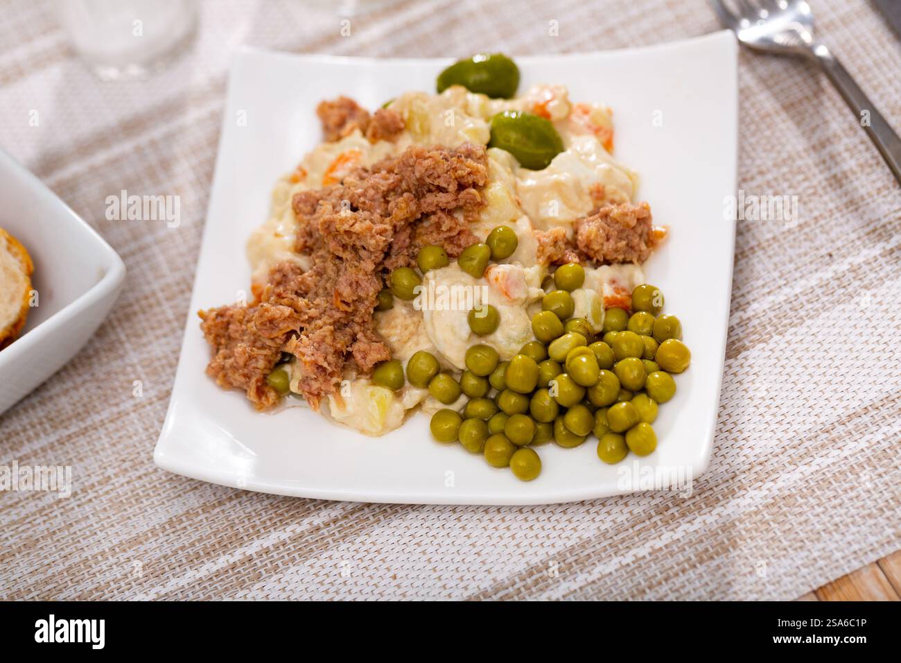 Spanish salad called Ensalada rusa Stock Photo - Alamy