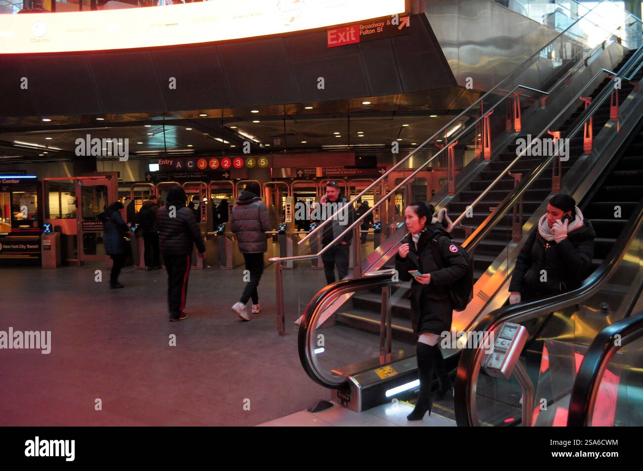 People walk through the Fulton Center subway station in Manhattan, New ...