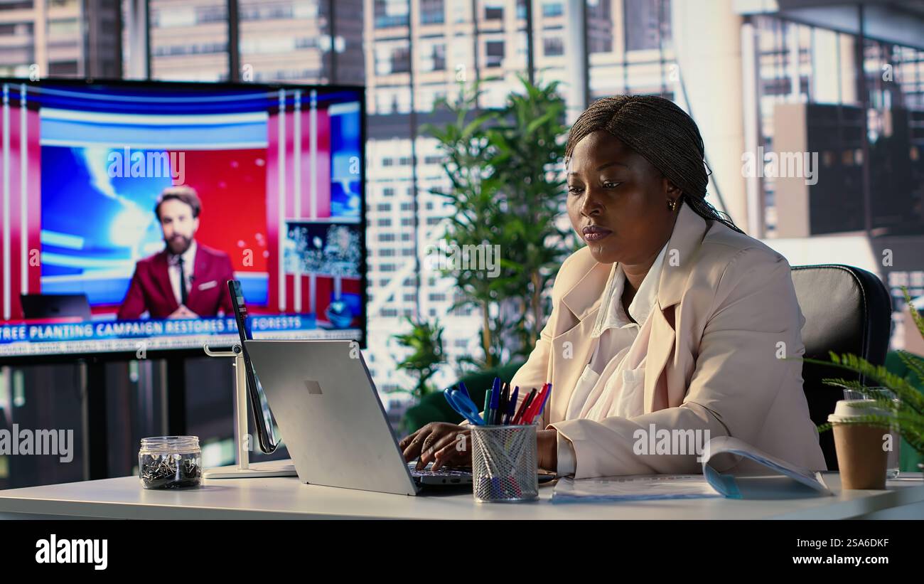 Empowered black female CEO working on career development strategy ...