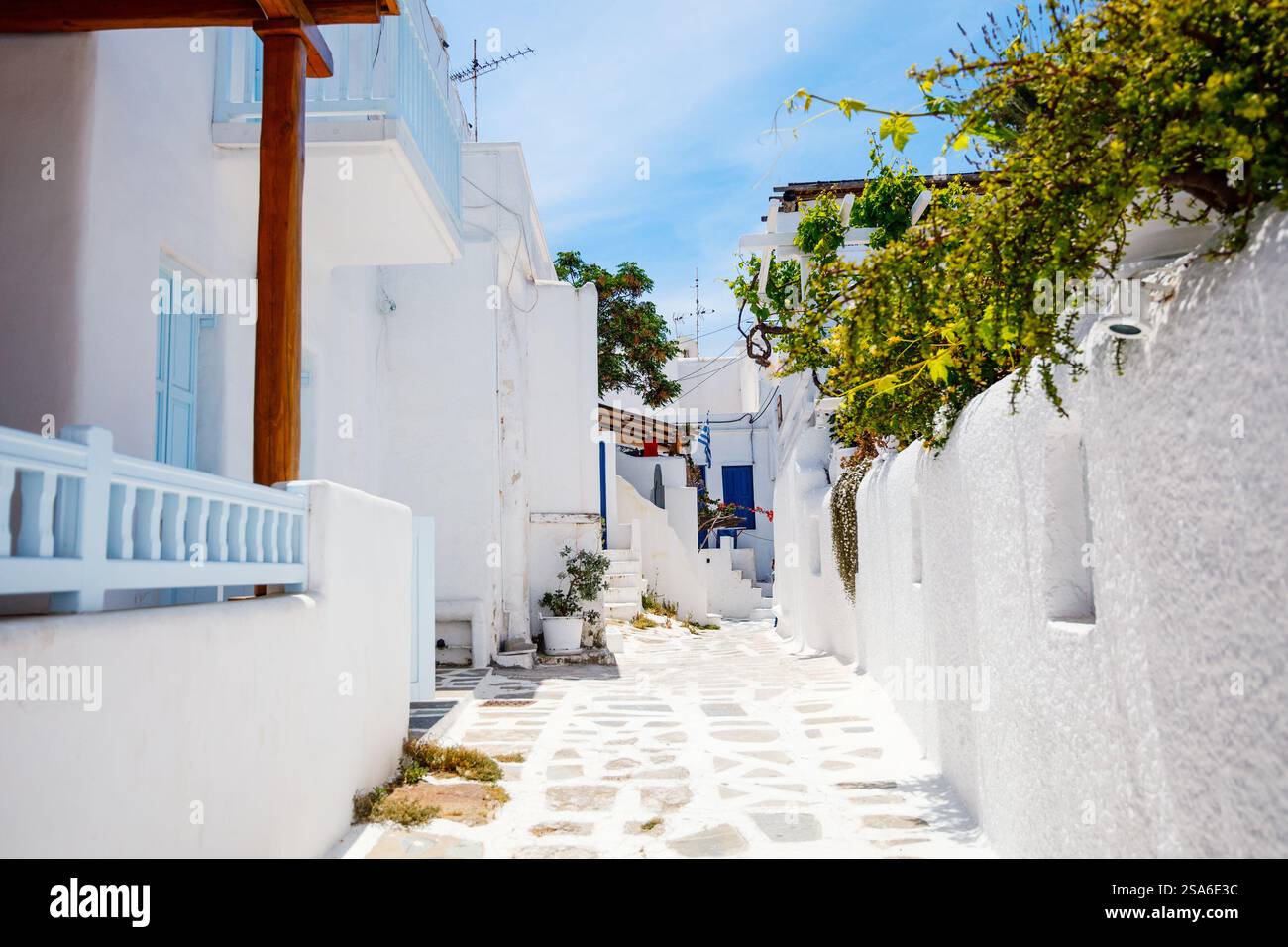 Typical greek traditional village with white walls and colorful doors ...