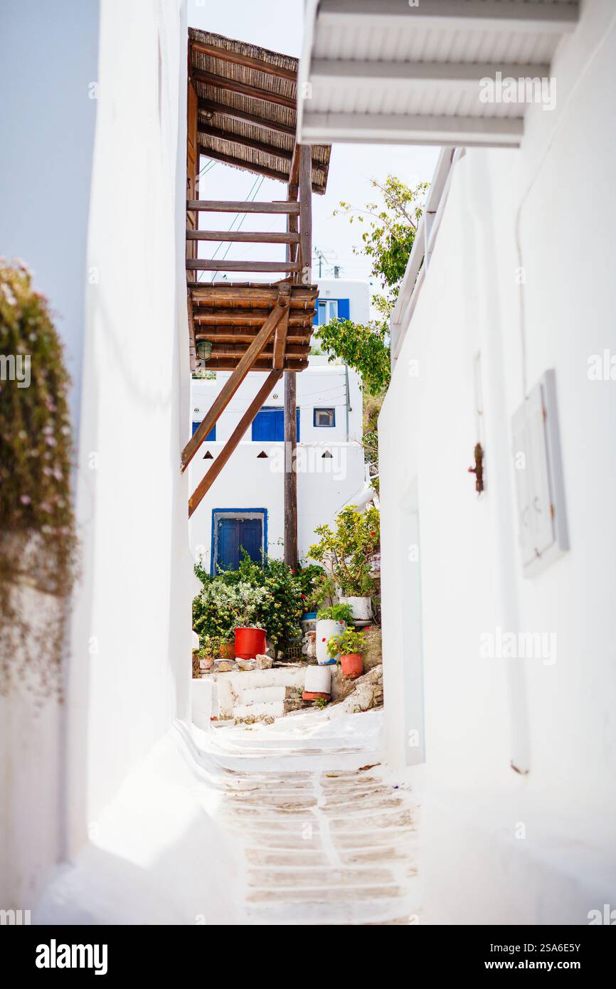 Typical greek traditional village with white walls and colorful doors ...
