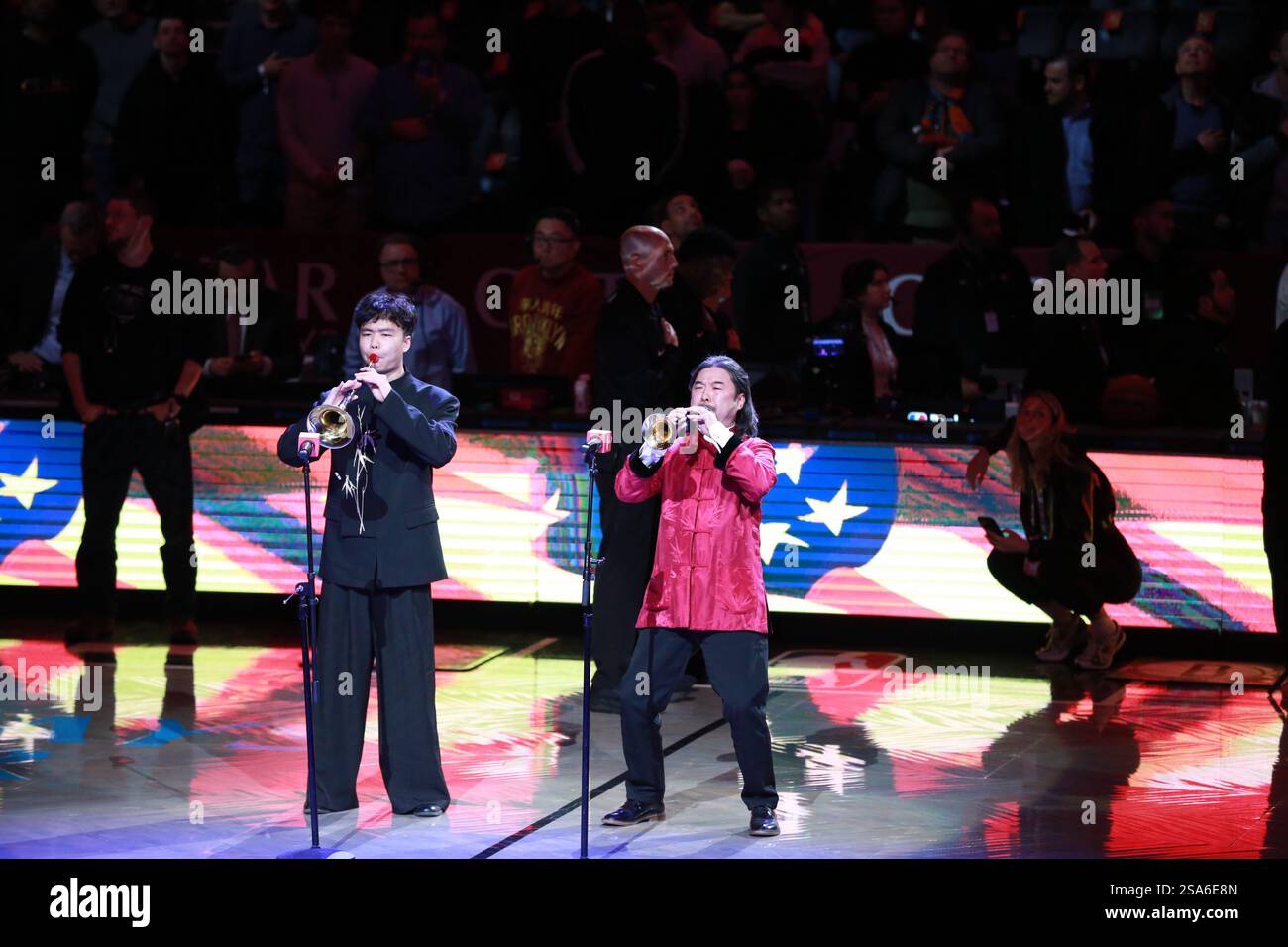 New York, USA. 27th Jan, 2025. Guo Yazhi (R, Front), a renowned suona ...