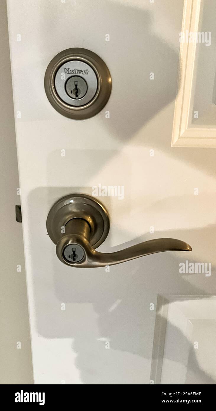Keyed entry door lock with deadbolt installed Stock Photo - Alamy