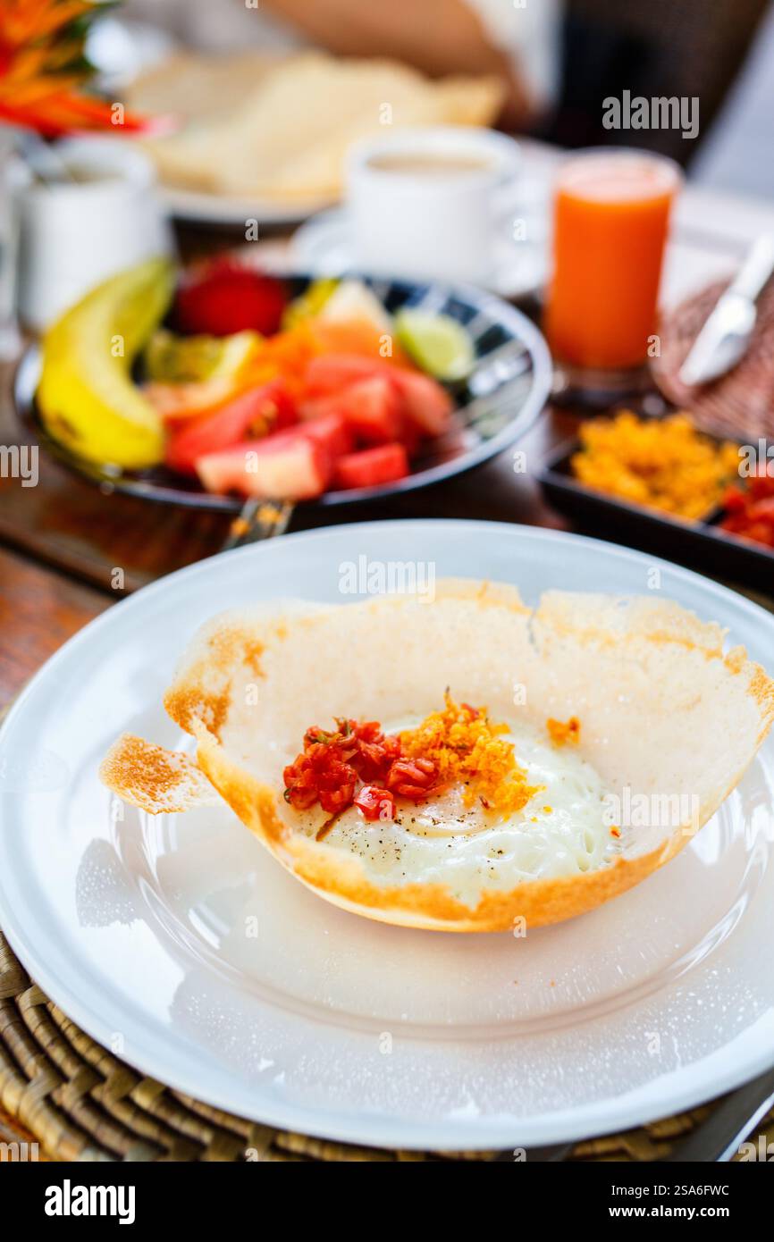 Traditional Sri Lankan breakfast with egg hoppers Stock Photo - Alamy