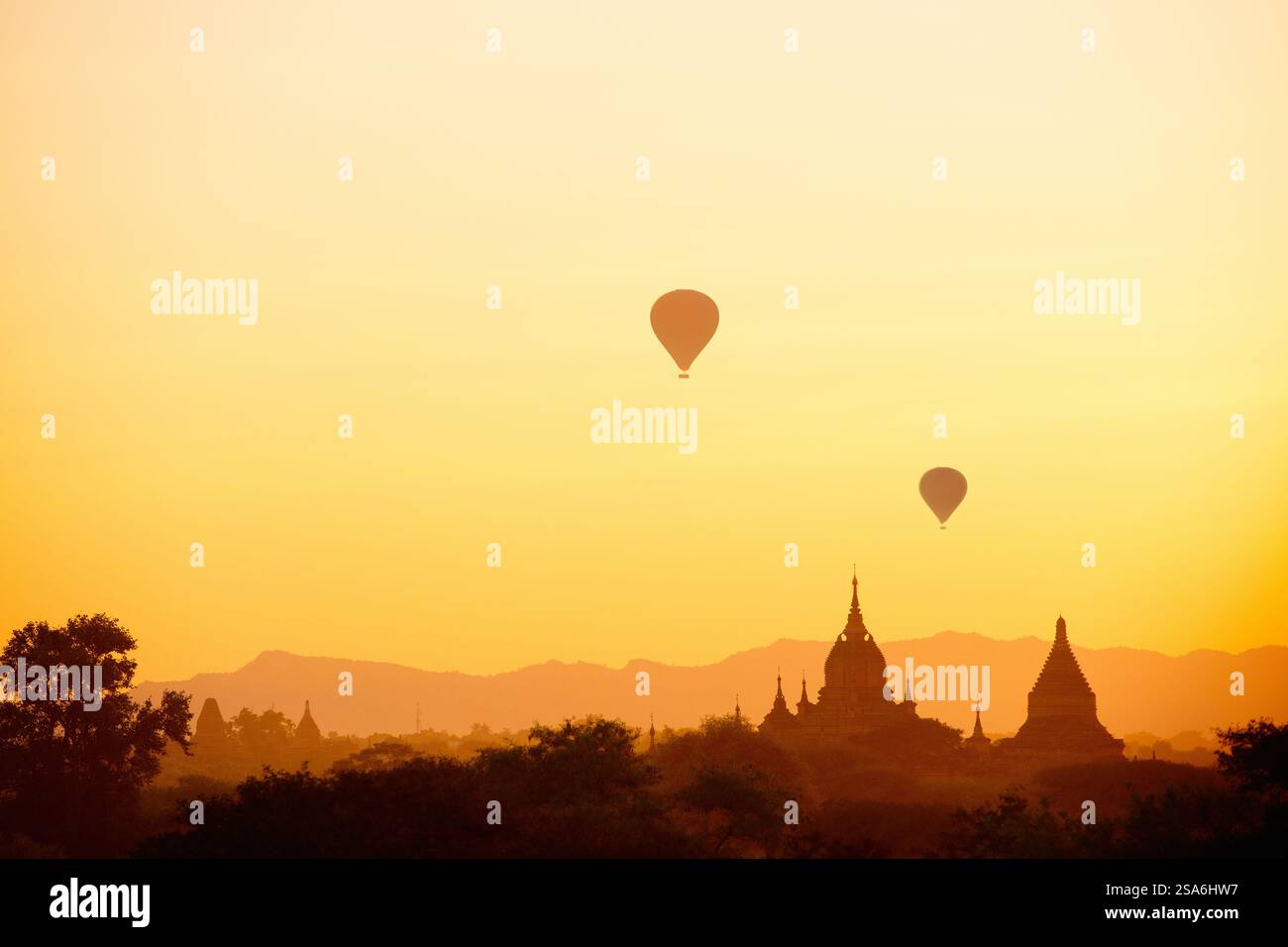 Stunning sunrise view of hot air balloons fly over thousands of ancient ...