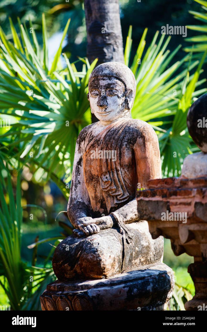 Ancient Buddha statue in temple complex in Bagan Myanmar Stock Photo ...