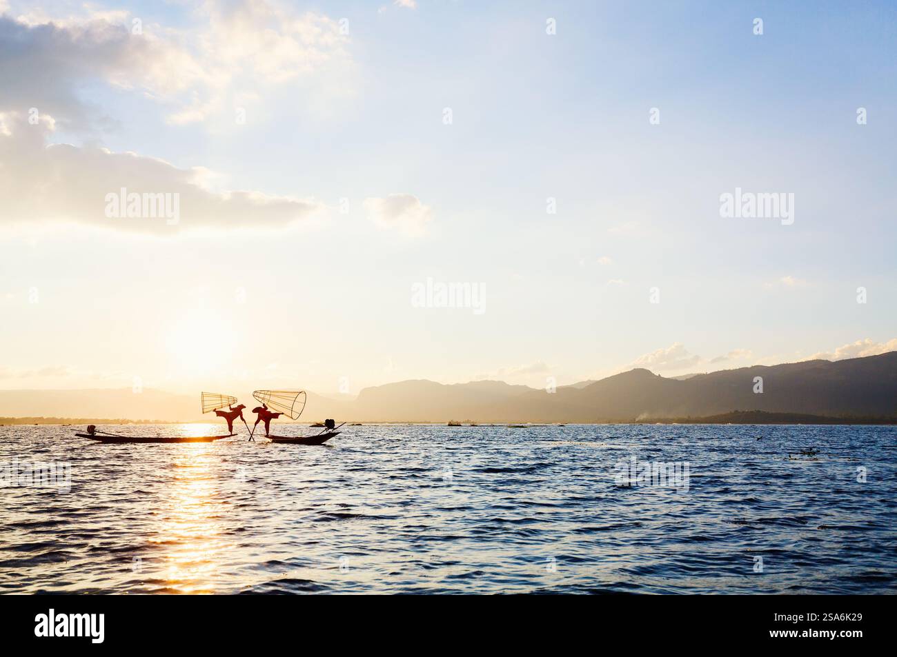 Stunning landscape of Inle lake and Burmese fishermen on bamboo boats ...