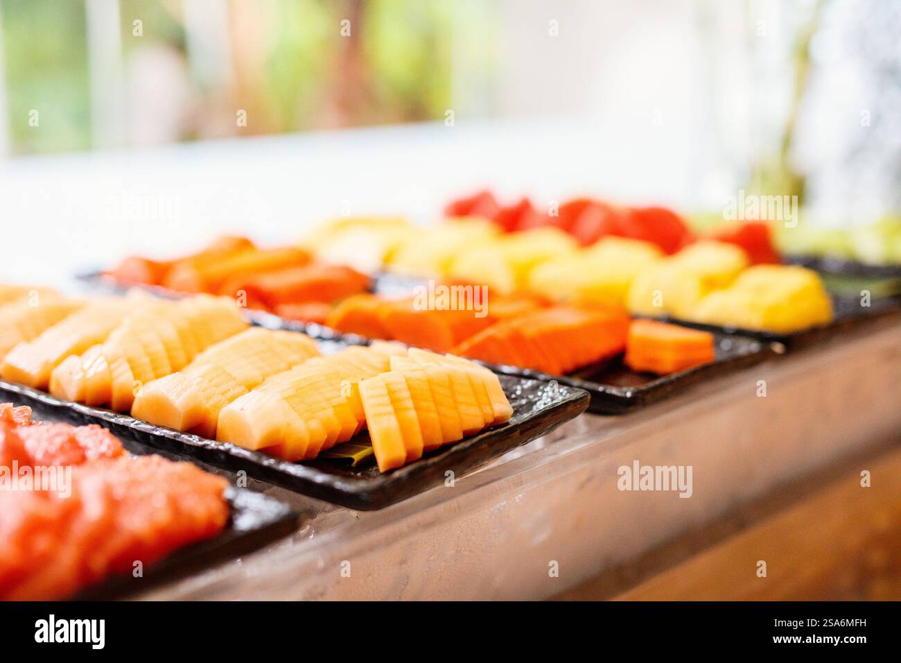 Delicious organic fruits served for breakfast in buffet restaurant ...