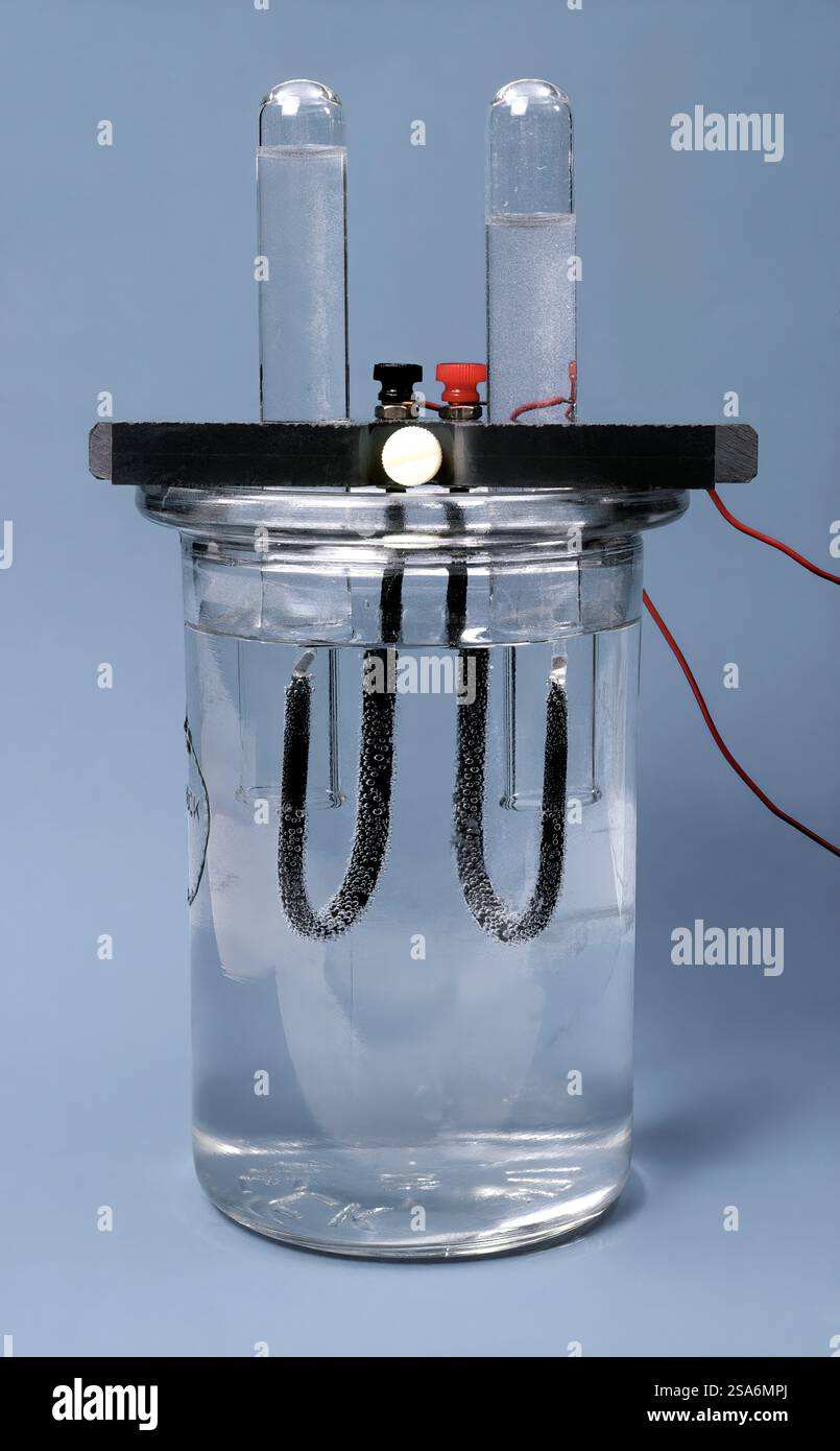 Electrolysis of water, demonstrating the production of hydrogen and ...