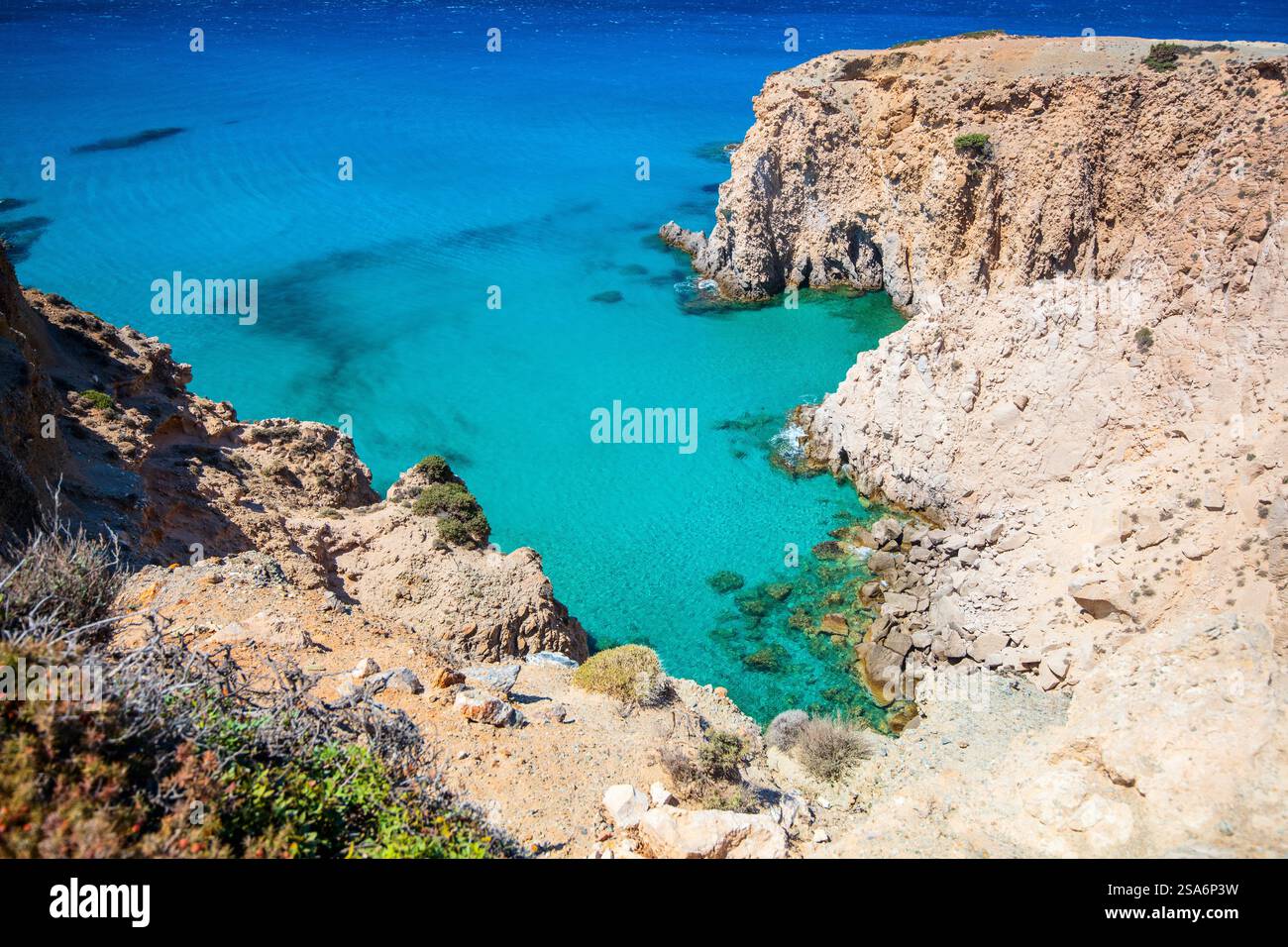 Idyllic Fyriplaka beach surrounded by beautiful cliffs on Greek island ...