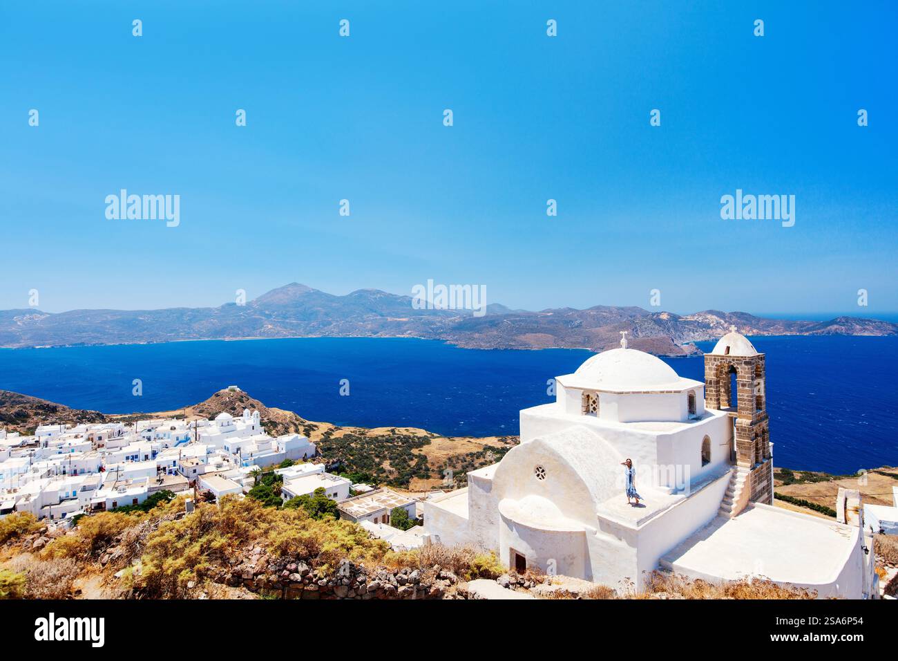 Traditional whitewashed Greek Orthodox church in Plaka village on Milos ...