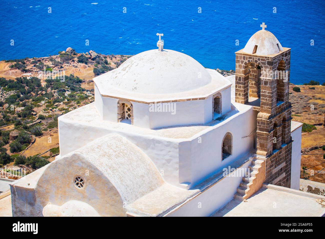 Traditional whitewashed Greek Orthodox church in Plaka village on Milos ...