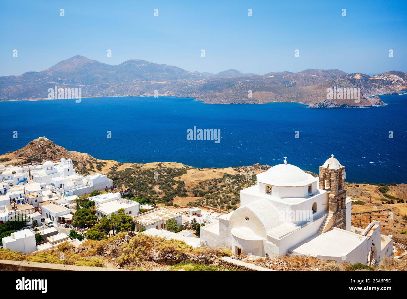 Stunning view over traditional whitewashed Greek Orthodox church and ...