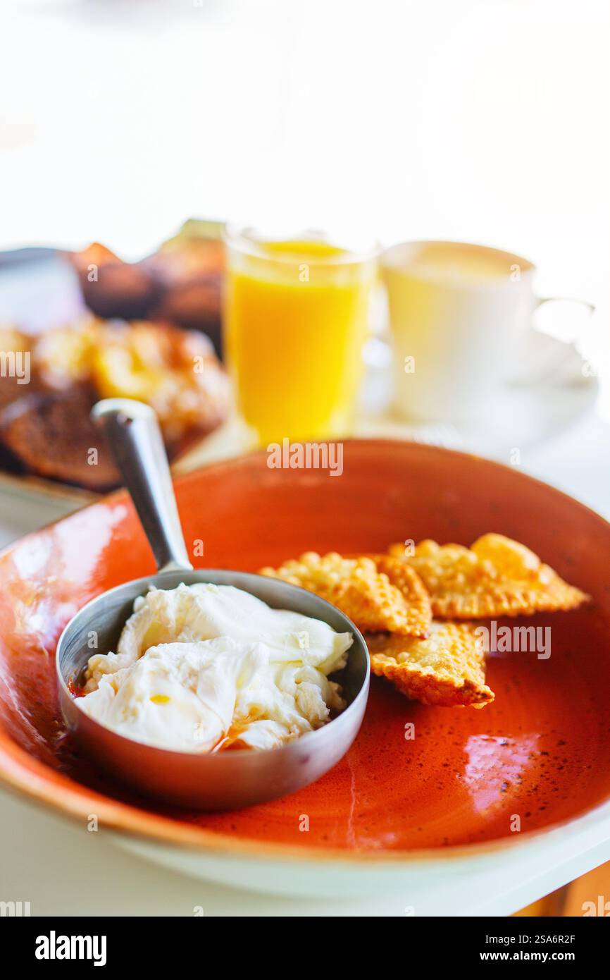 Aruba breakfast with egg casserole, cheese pastechi and orange juice ...