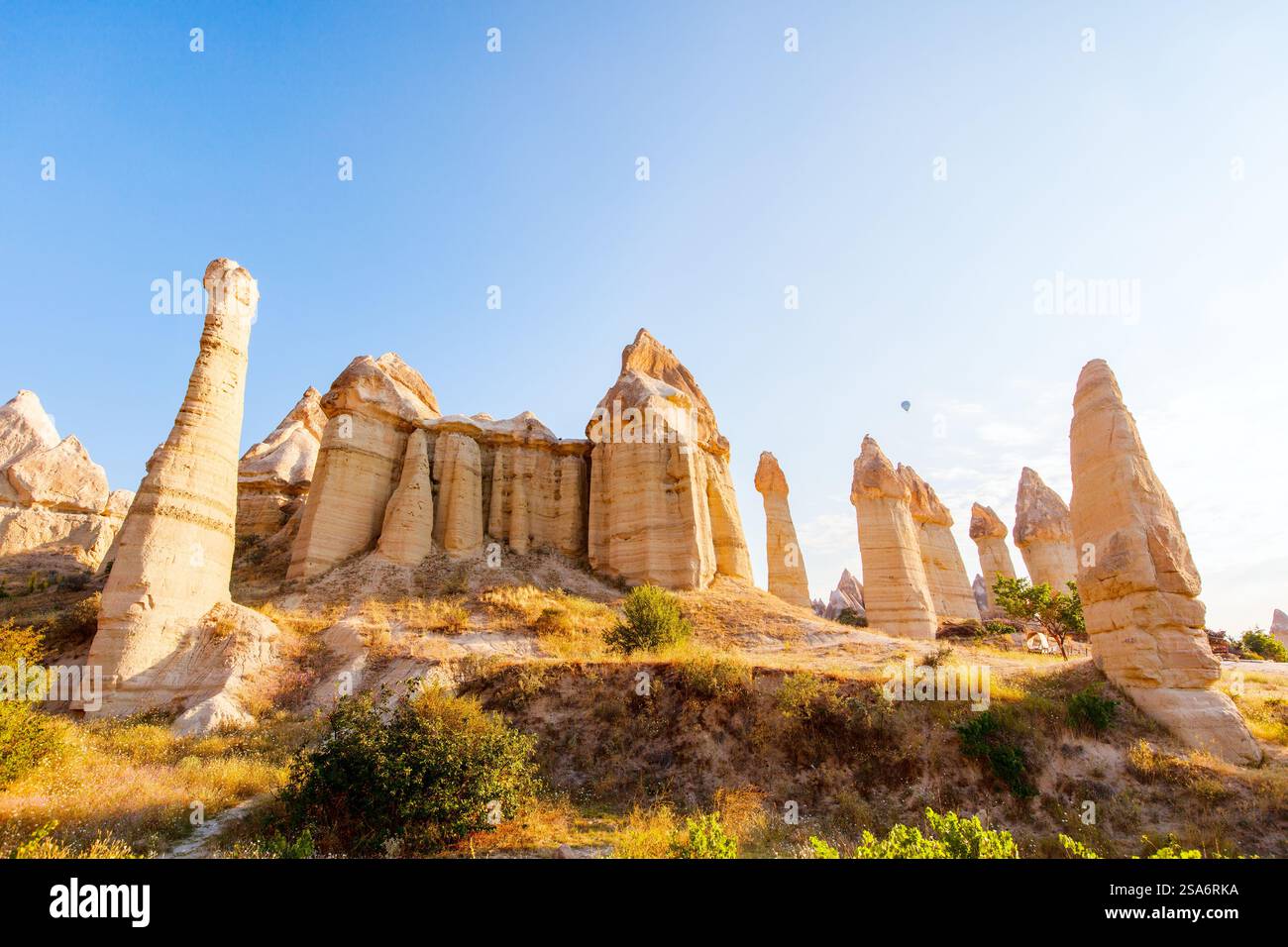 Love valley view with rock formations and fairy chimneys in Cappadocia ...