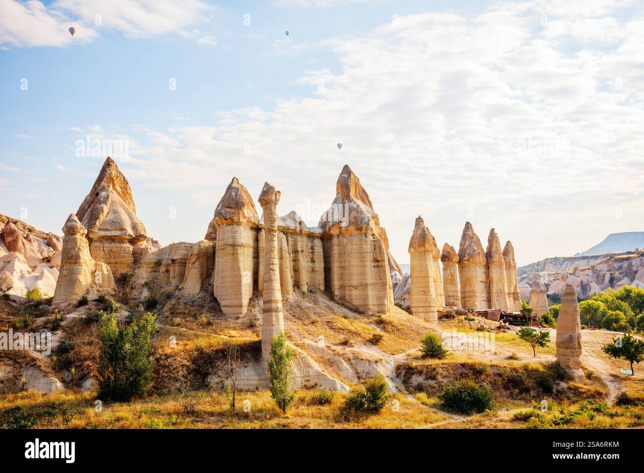 Love valley view with rock formations and fairy chimneys in Cappadocia ...