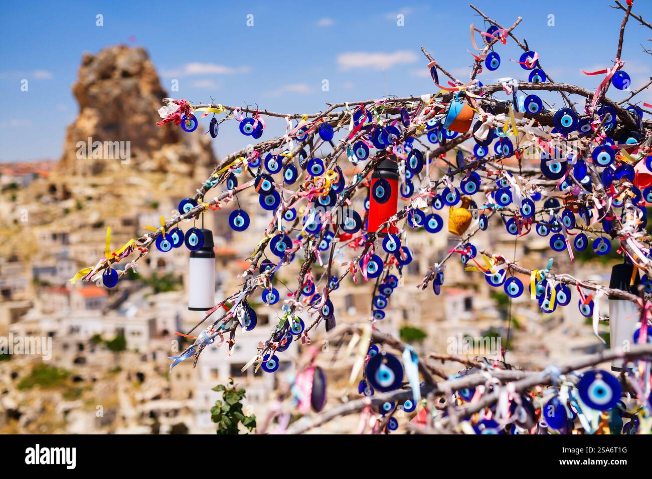 Evil eye charms hang from tree in Cappadocia Turkey for good luck Stock ...