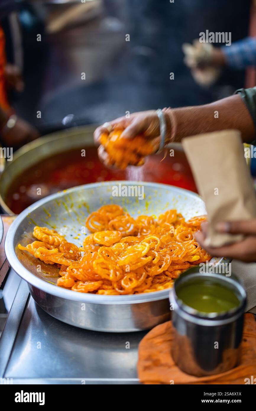 Jalebis coated in sugar syrup delicious Indian dessert street food ...