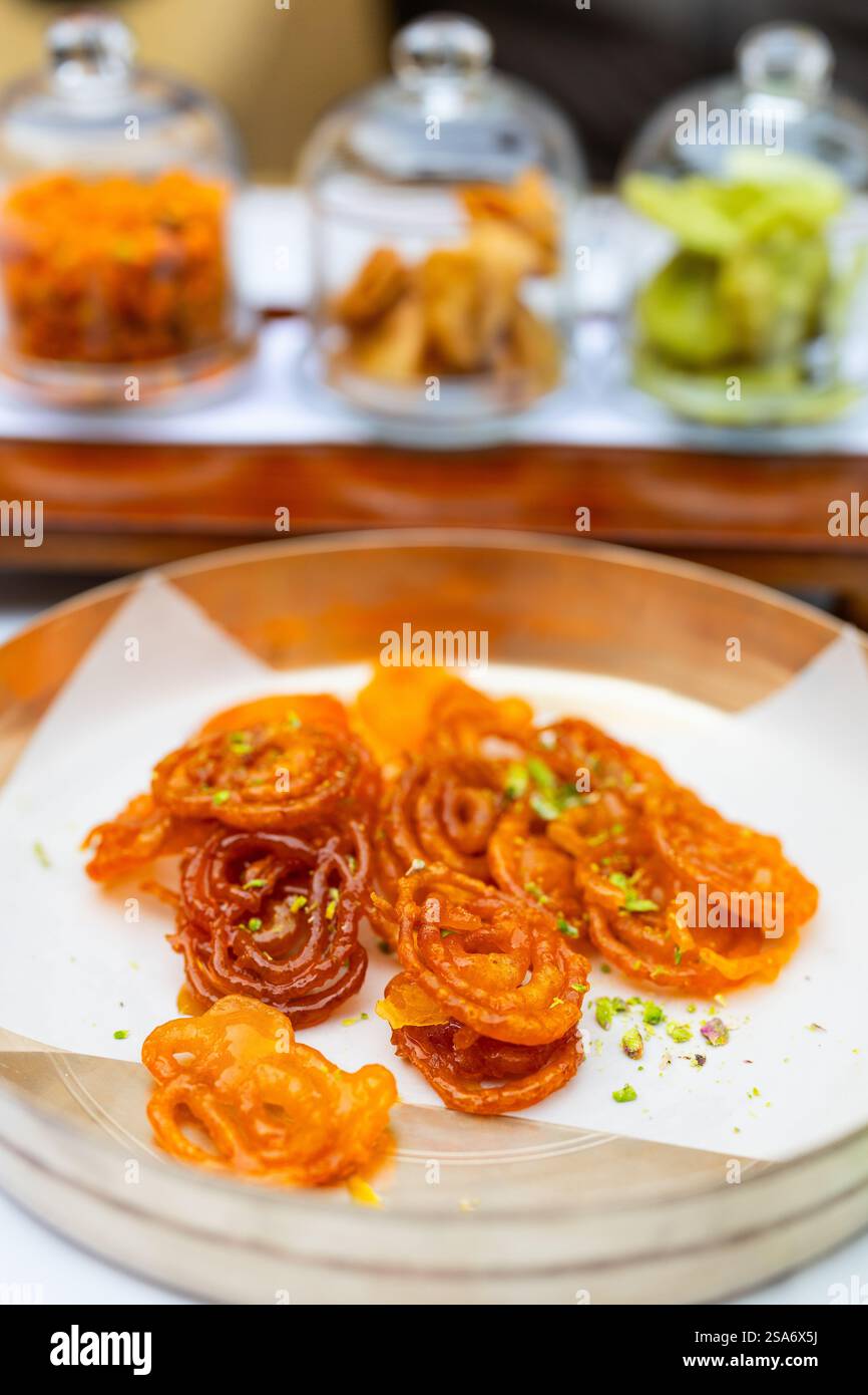 Jalebis coated in sugar syrup delicious Indian dessert food served for ...