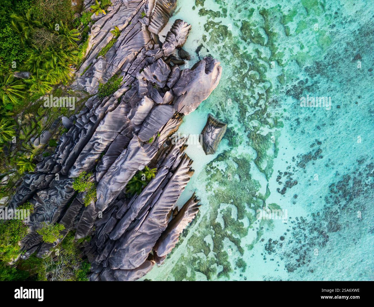Aerial view of La Digue, Seychelles, featuring striking granite rock ...