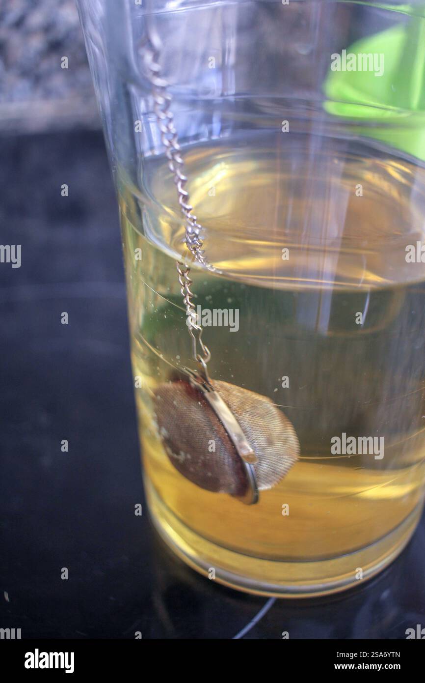 making a tea at home after lunch Stock Photo - Alamy