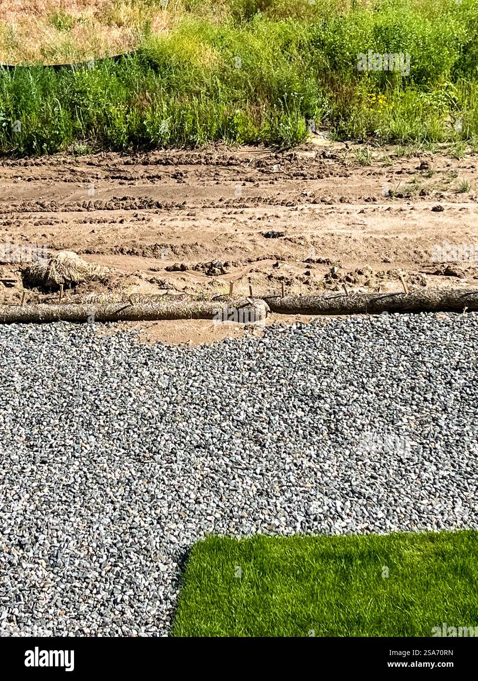 Erosion Control with Straw Wattle Installation Stock Photo - Alamy