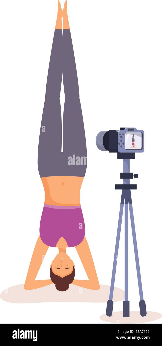 Young woman in sportswear practicing yoga headstand pose recording ...