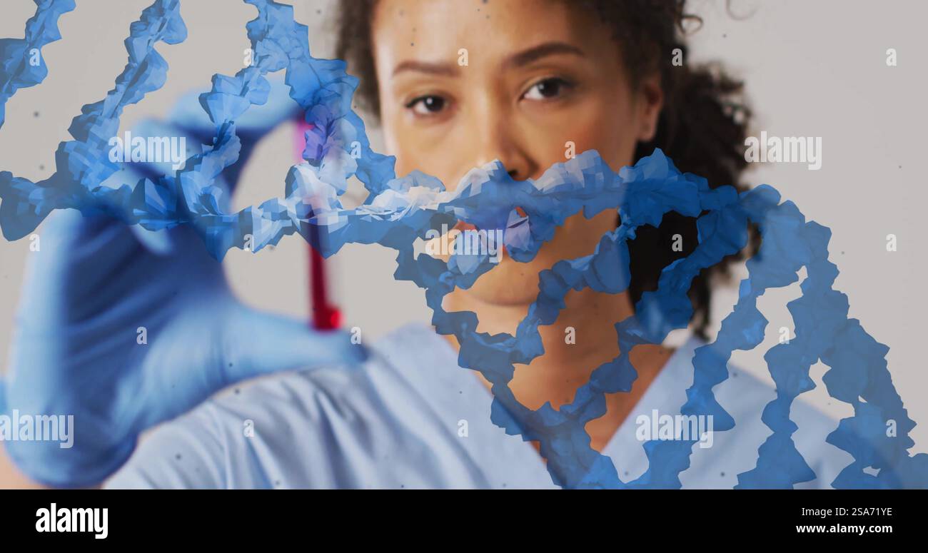 Image of blue dna strand over biracial female doctor holding blood ...