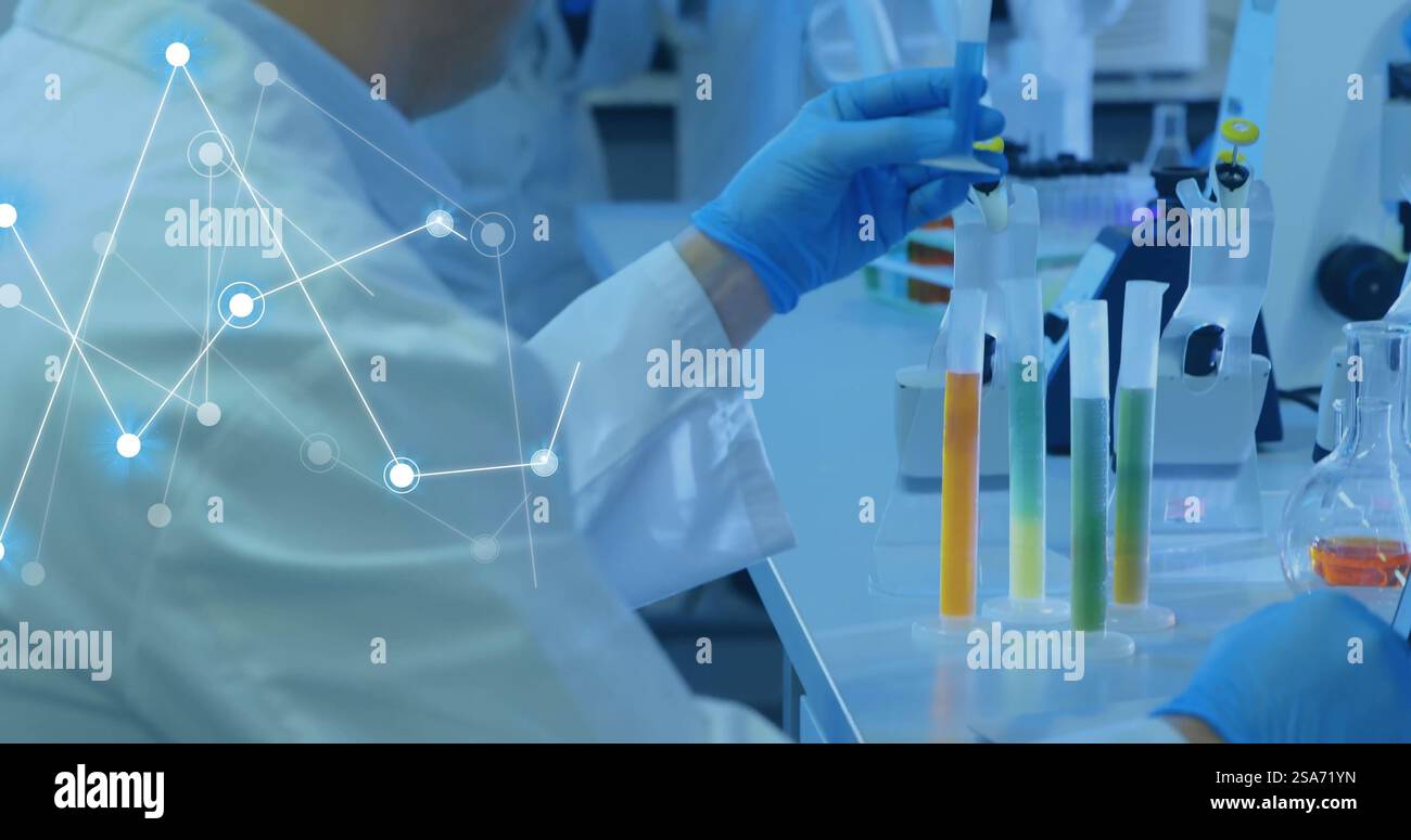 Scientists working in laboratory network hi-res stock photography and ...