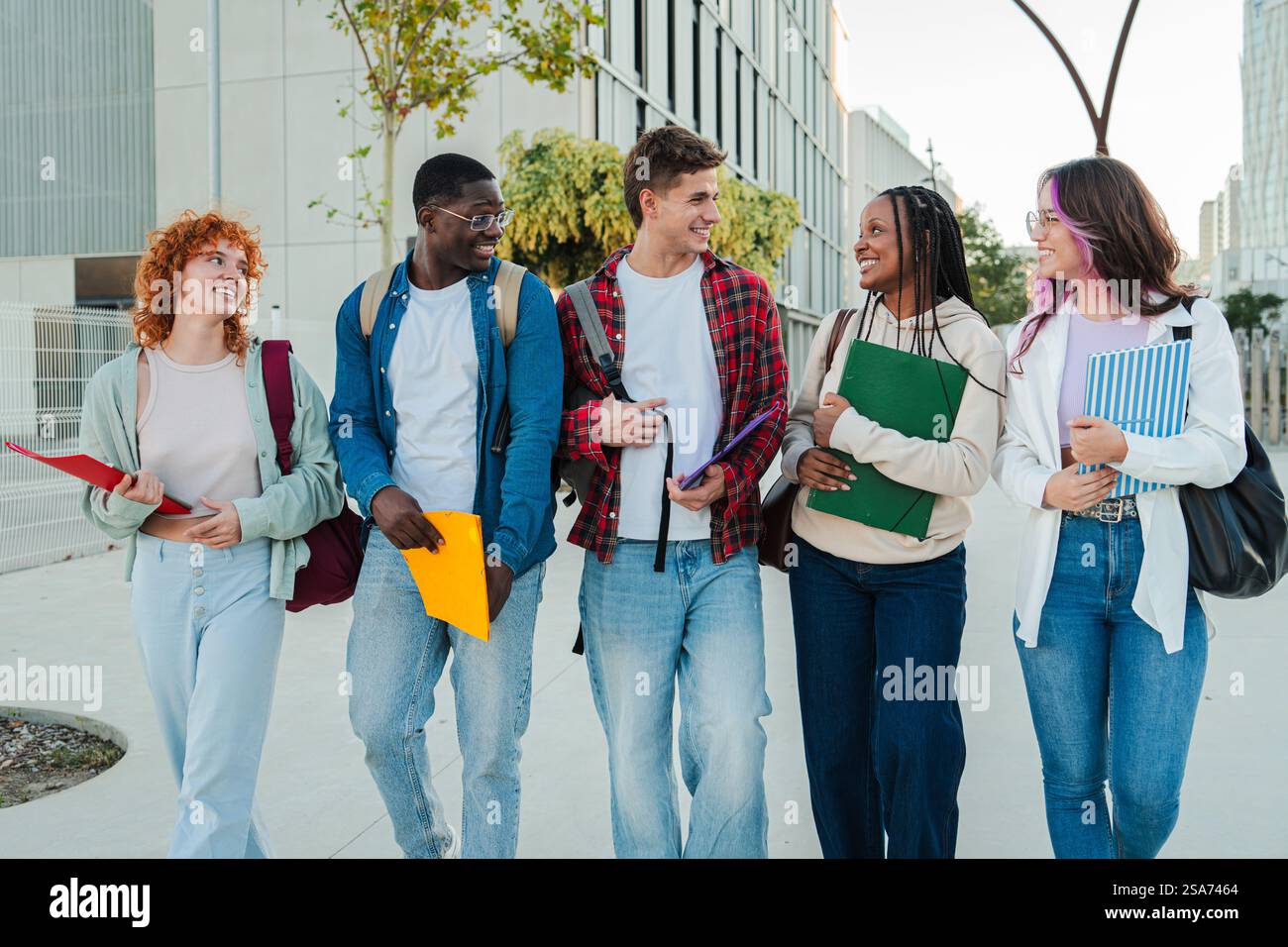Lively group diverse college friends hi-res stock photography and ...