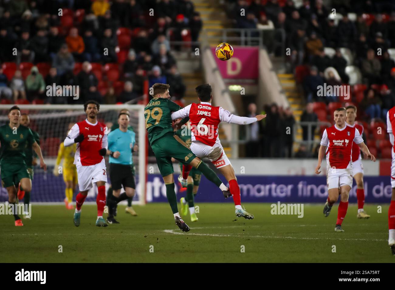 Dominic Ballard of Cambridge United and Reece James of Rotherham United ...