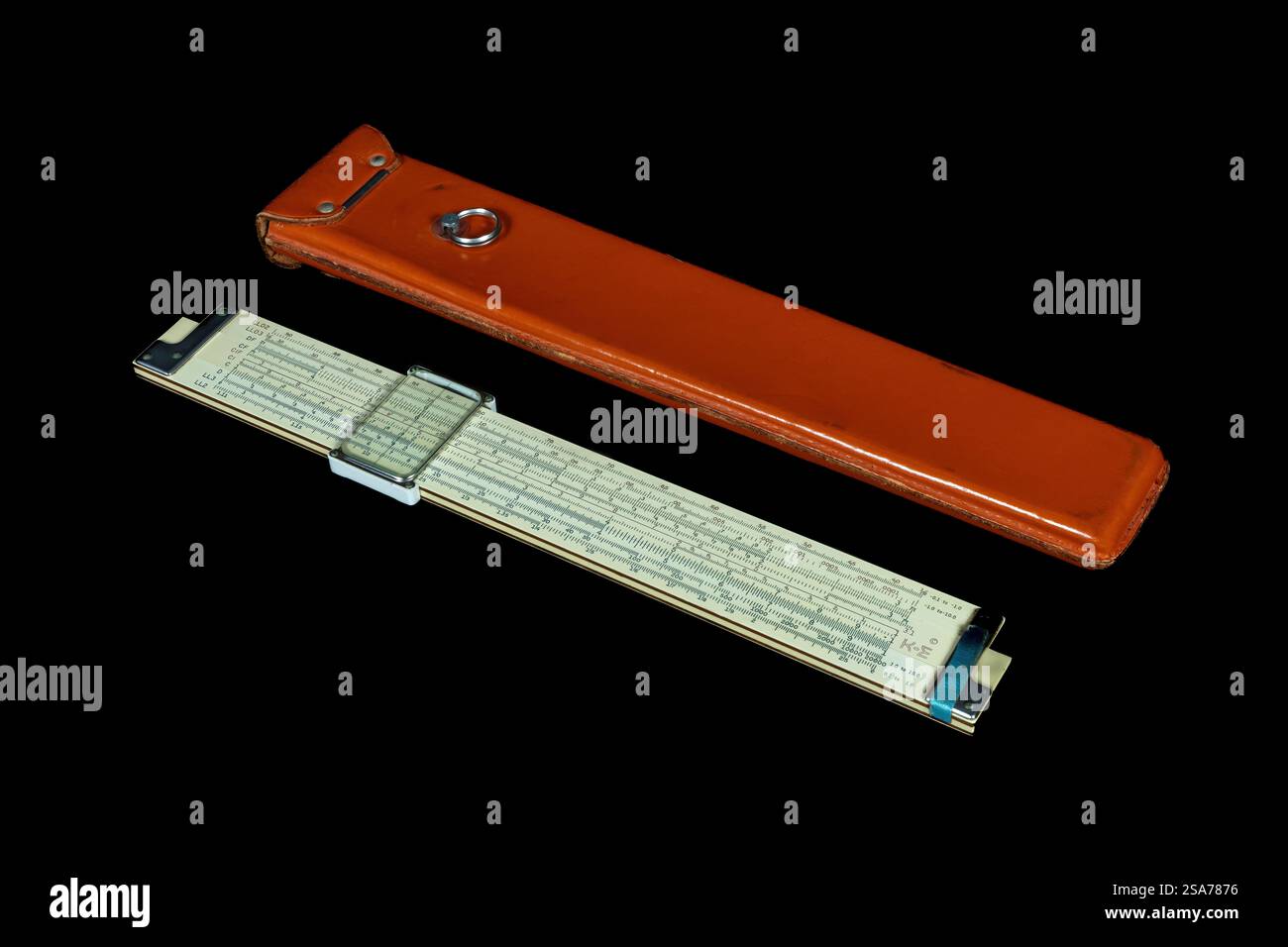 Yellow engineer's slide rule, circa 1950s. Yellow plastic, with brown ...