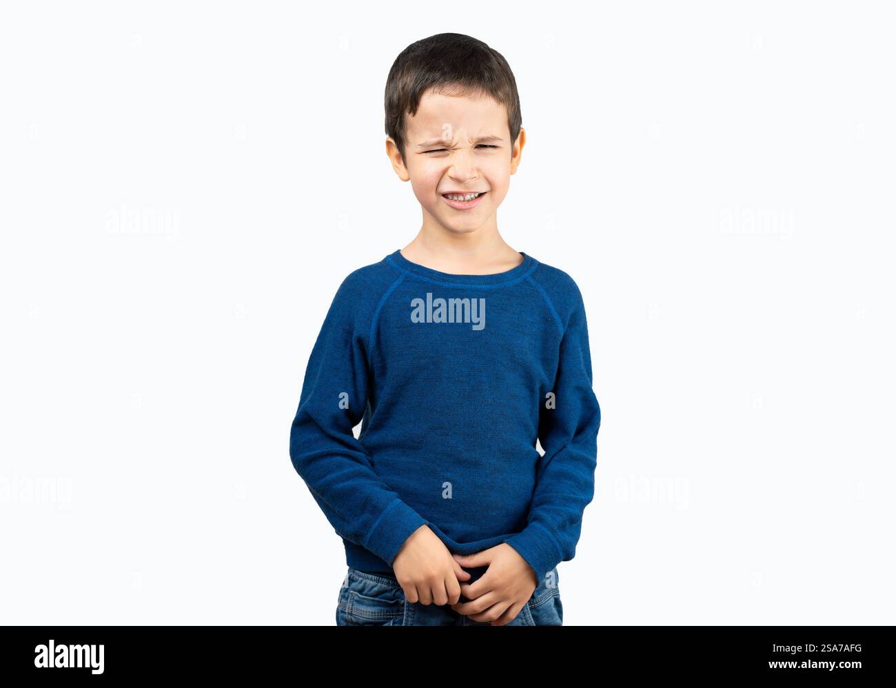 Portrait of a boy expressing regret for the mistake, he forgot to do ...