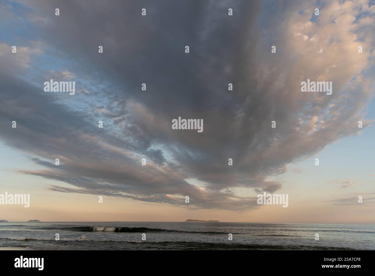 Rain clouds in the late afternoon at Gamboa Beach, Santa Catarina ...