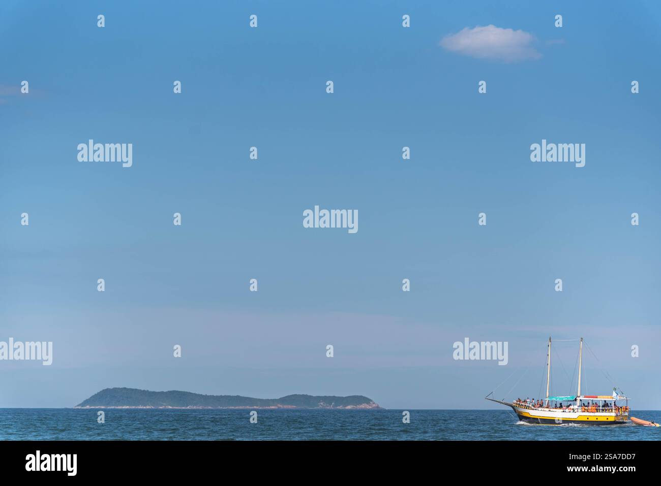 Tourist boat on the coast of Gamboa beach, Santa Catarina, Brazil.NEF ...