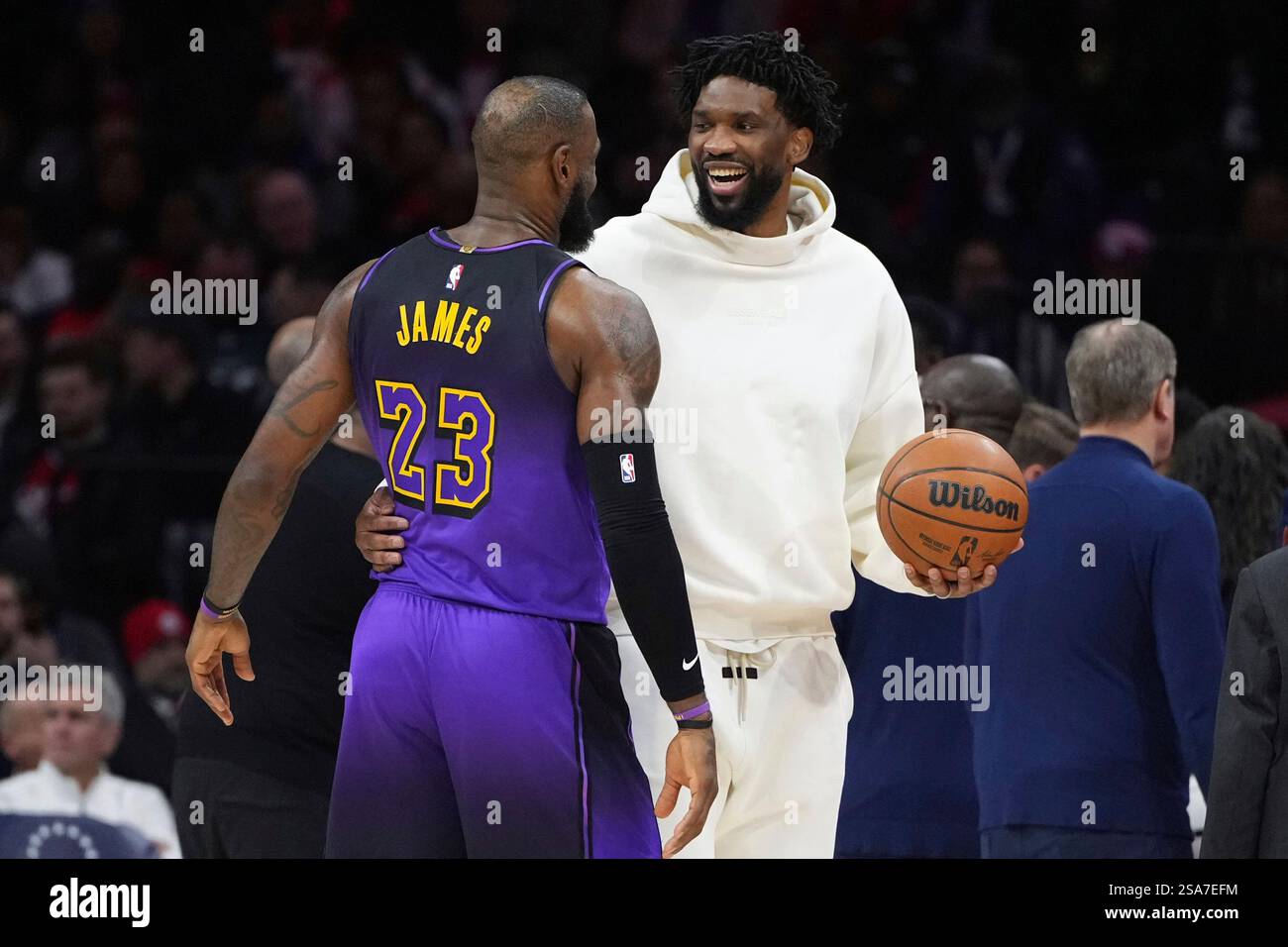 Philadelphia 76ers' Joel Embiid, right, and Los Angeles Lakers' LeBron ...