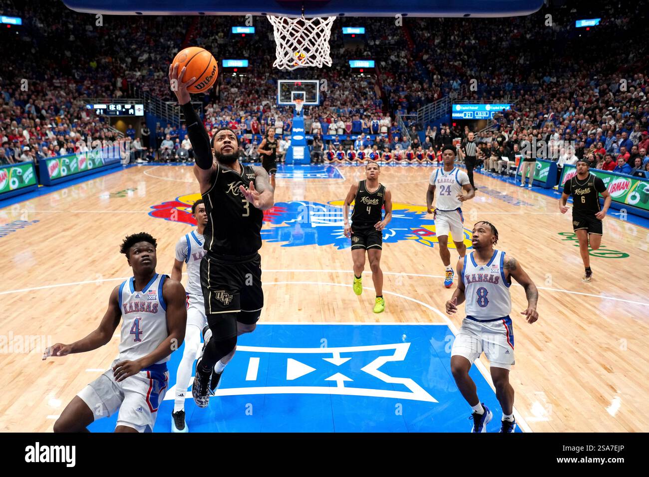 UCF guard Darius Johnson (3) puts up a shot during the first half of an ...
