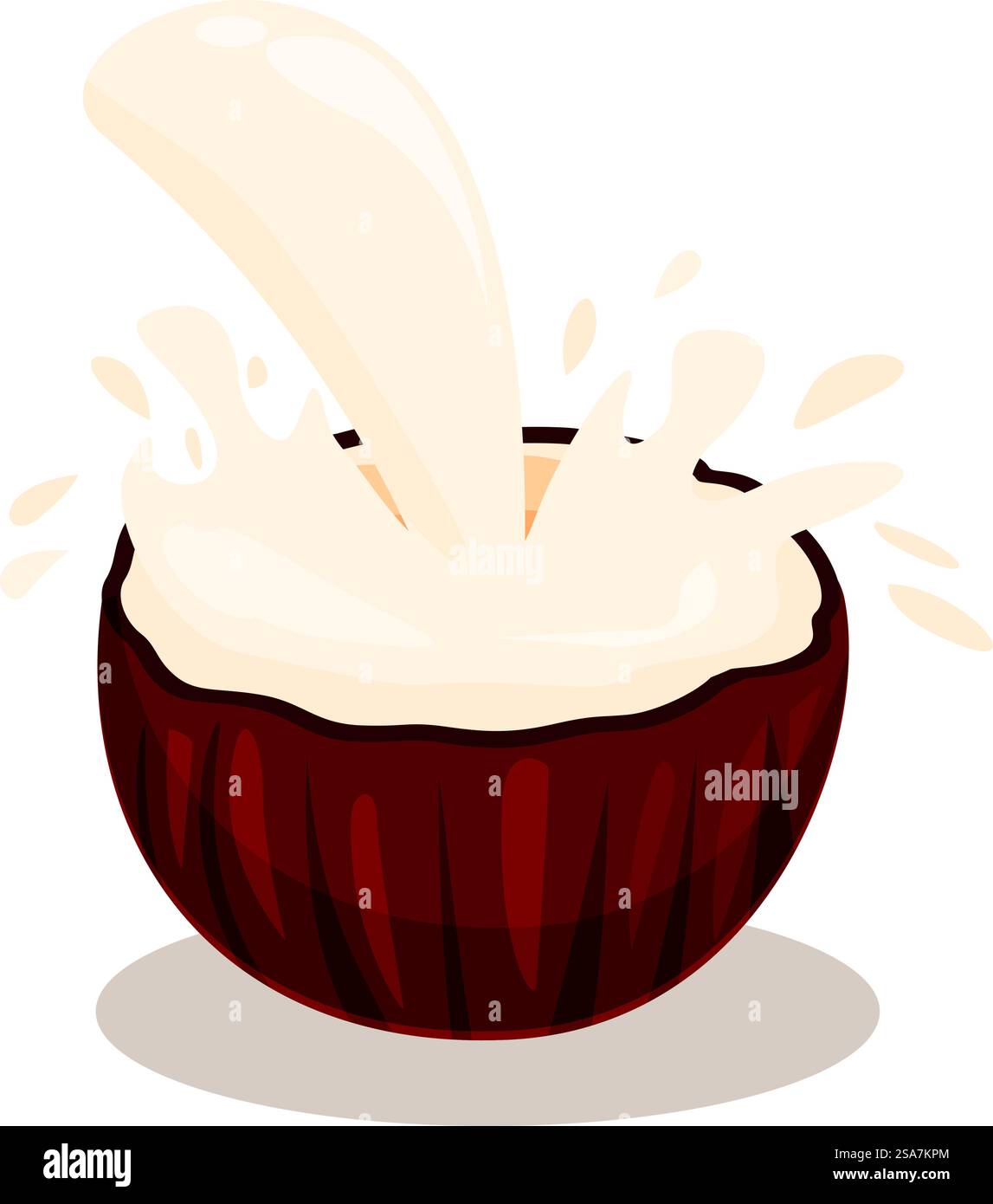 Coconut milk is splashing into a coconut shell creating a refreshing ...