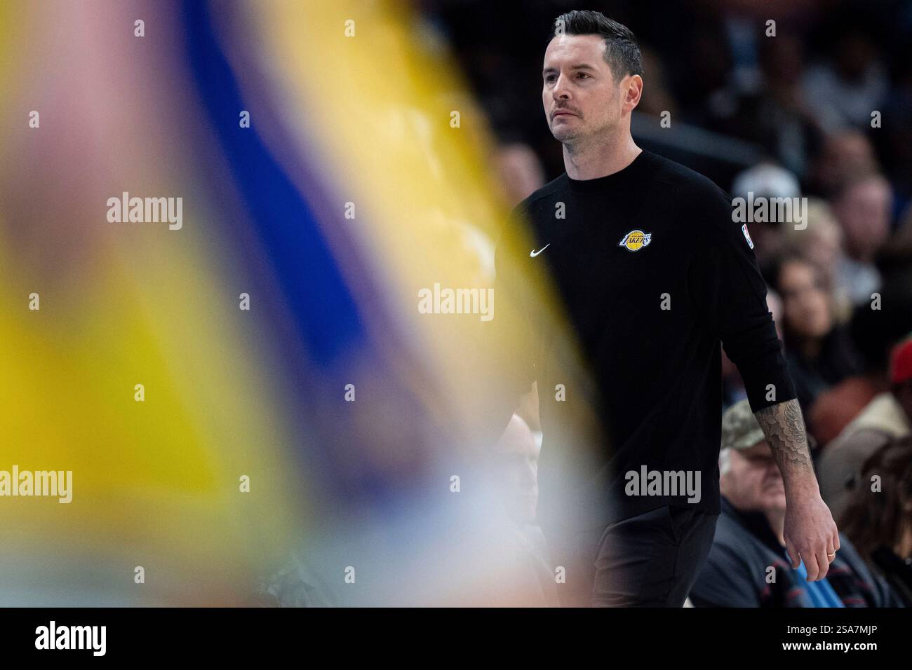 Los Angeles Lakers head coach JJ Redick looks on against the Charlotte ...