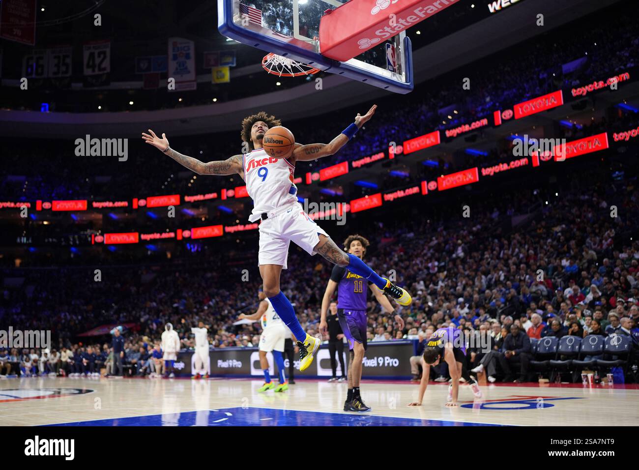 Philadelphia 76ers' Kelly Oubre Jr. reacts after a dunk during the ...