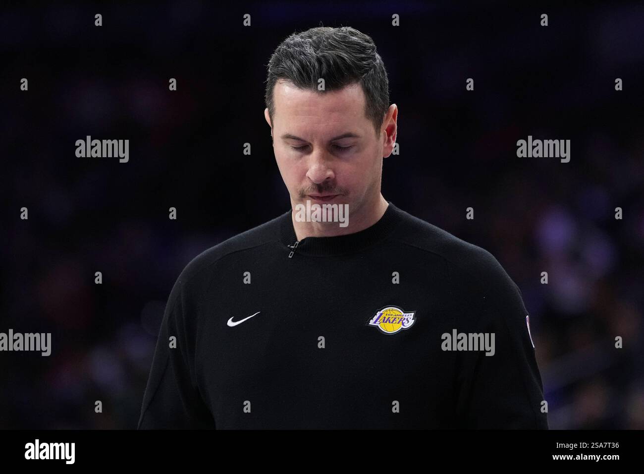 Los Angeles Lakers' JJ Redick walks the court during an NBA basketball ...