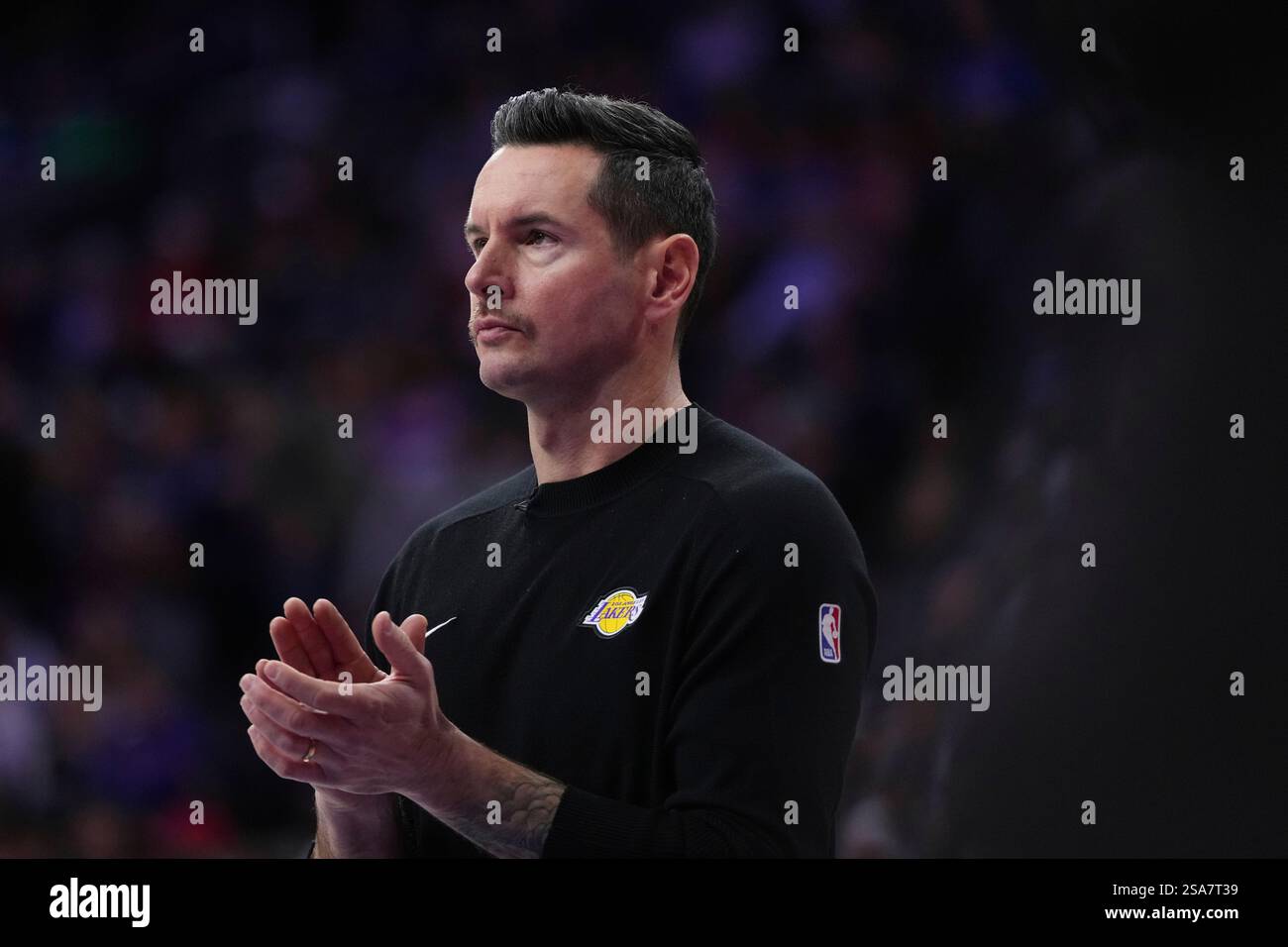 Los Angeles Lakers' JJ Redick walks the court during an NBA basketball ...