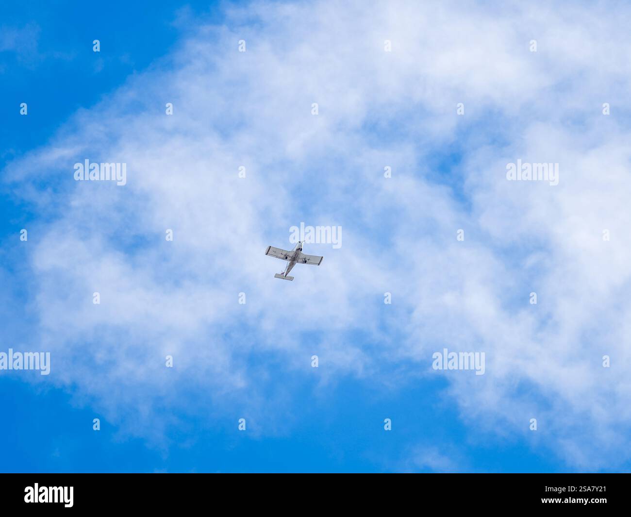 Small ultralight airplane with overhead wing and single propeller ...